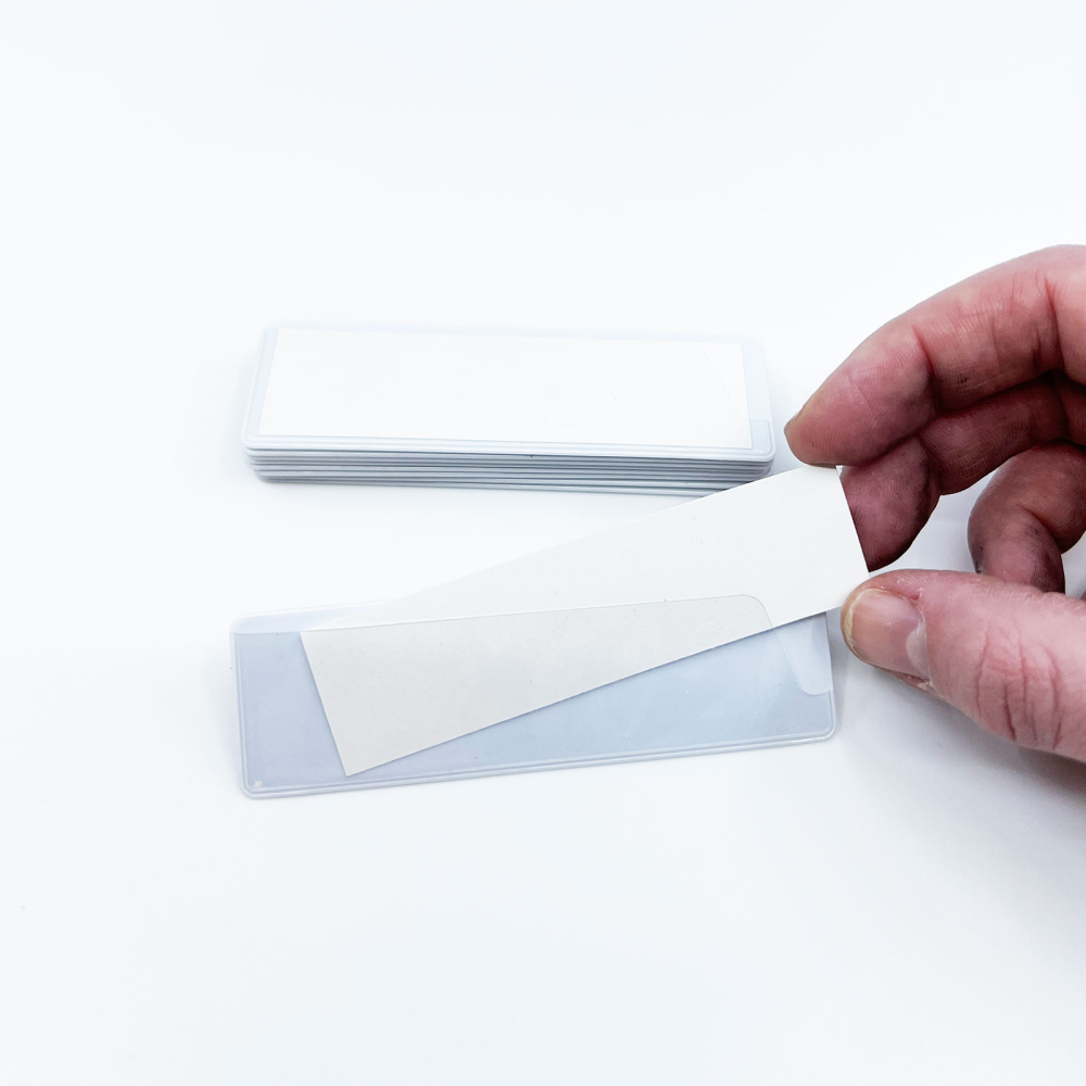 Magnetlommer 10x3 cm., Hvit (10-pakk) | Flexible lagerlommer, kr. 99,00/pk.